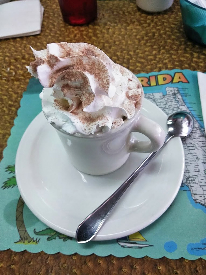 Hot chocolate that doesn't just arrive &ndash; it makes an entrance, with whipped cream and cinnamon creating a miniature Alps on your saucer.