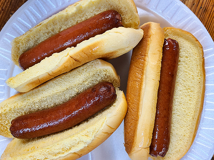 Hot dogs living their best life, nestled in pillowy buns. Simple pleasures that remind you why some classics never need reinvention.