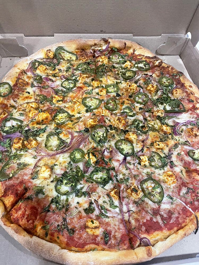 Pizza perfection with a kick &ndash; jalape&ntilde;os, fresh herbs, and a perfect cheese blend make this pie a spicy standout.