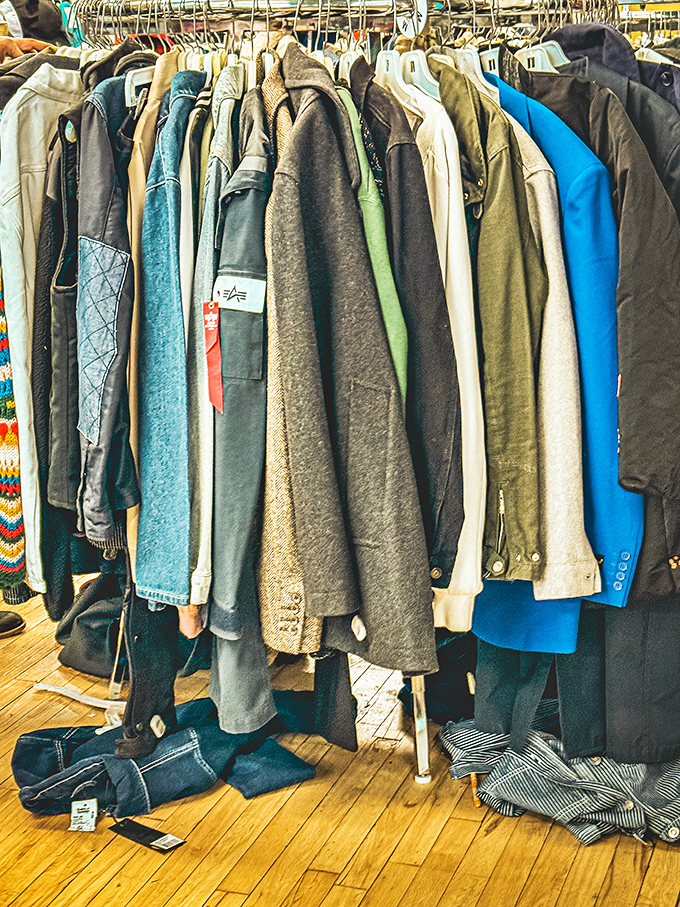 A textile timeline hanging in perfect formation &ndash; each jacket a chapter in someone's life story, ready for its sequel with a new owner.