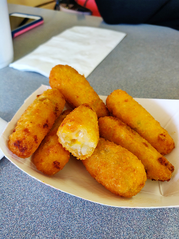 Cheese munchers that could make a Frenchman forsake his Camembert. Crispy outside, molten inside—the Midwest's answer to haute cuisine.