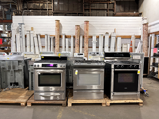 Stainless steel stoves lined up like contestants on a cooking show, ready to bake your next culinary masterpiece perfectly.