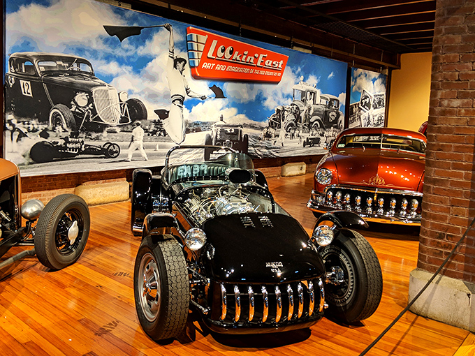 Hot rod heaven! This menacing black beauty with its exposed engine looks ready to tear up a 1950s drag strip or star in a James Dean movie.
