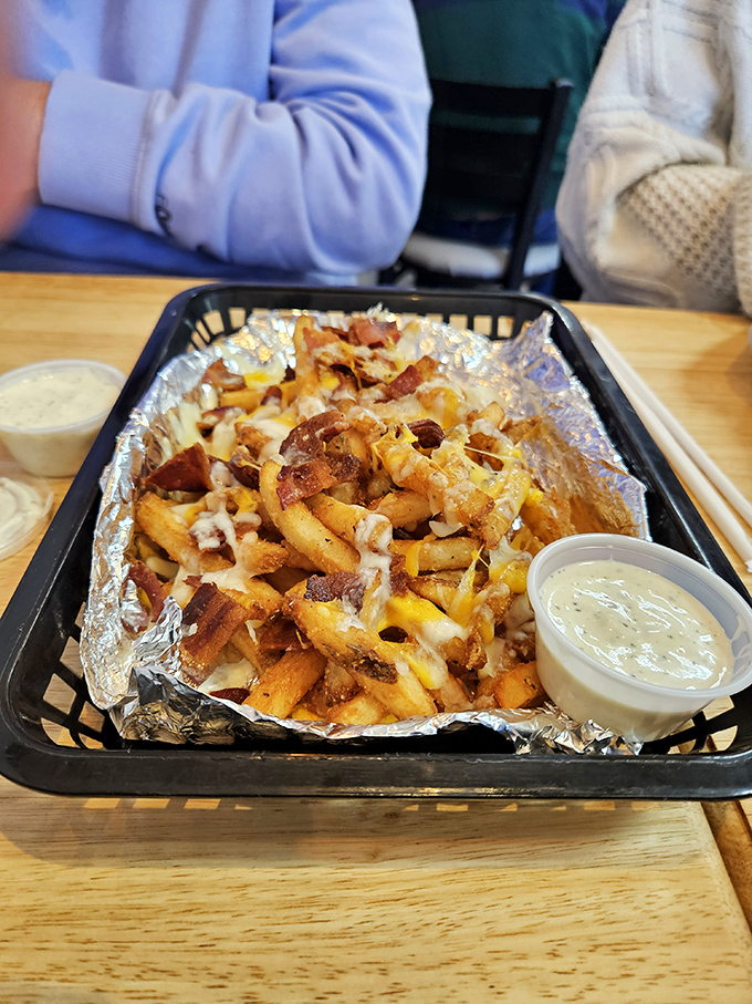 The holy grail of diner indulgence &ndash; loaded fries that demand both a fork and your undivided attention. That cheese pull deserves its own Instagram account.