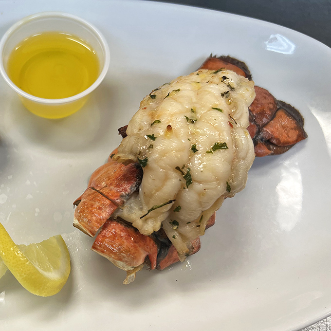 Lobster tail elevated beyond mere seafood&mdash;it's butter-bathed luxury that makes you wonder why you'd ever order anything else.