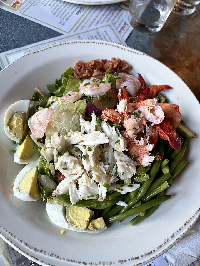 A seafood salad that makes eating greens feel like cheating &ndash; lobster and crab doing the heavy lifting of nutritional justification.