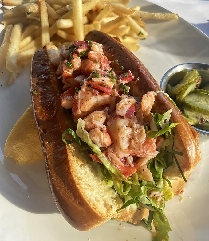 The lobster roll that launched a thousand return visits. Buttery brioche cradles chunks of sweet lobster meat &ndash; simplicity that speaks volumes.