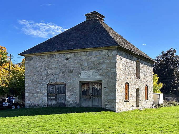 The historic Logan Temple Barn stands as a sturdy reminder of pioneer craftsmanship, where stone walls have witnessed generations of Cache Valley history.