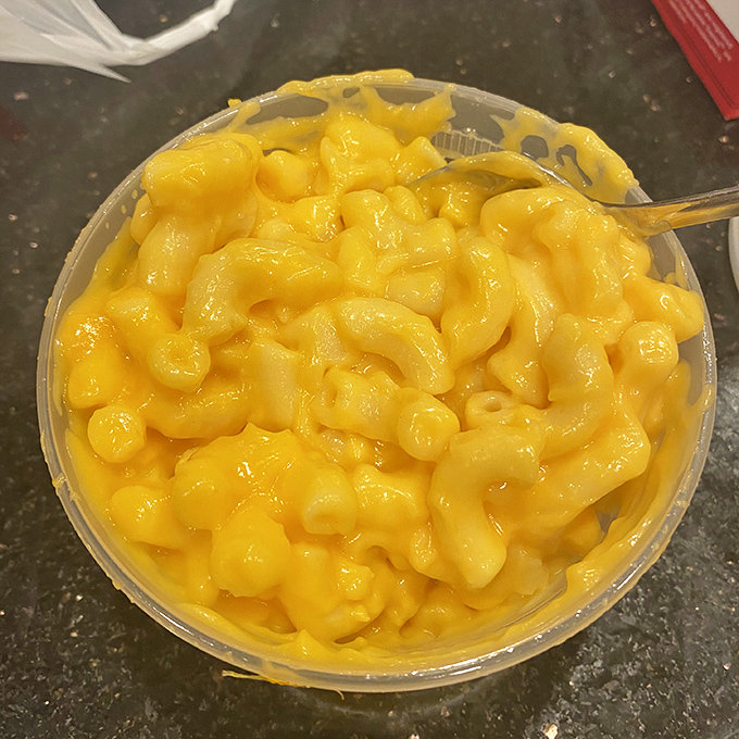 Mac and cheese that glows like liquid gold. The kind that makes you wonder why anyone bothers with fancy versions.