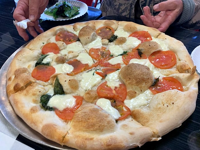 Fresh tomatoes and basil on a perfectly charred crust&mdash;sometimes simplicity is the most sophisticated choice you can make.