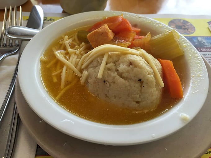 The matzo ball floats like a dumpling planet in a galaxy of golden broth &ndash; Jewish penicillin that cures whatever ails you.