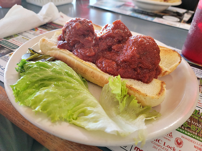 This meatball sub isn't messing around. It's the kind of sandwich that requires both hands, several napkins, and zero regrets.