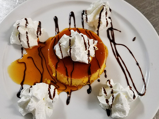 Flan that jiggles just right, topped with dollops of whipped cream and chocolate drizzle. Dessert shouldn't wear a tuxedo when it can dance in comfortable shoes.