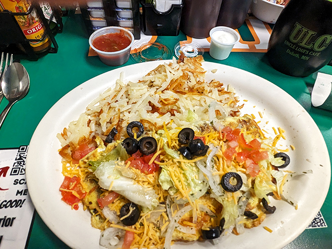 When an omelet comes loaded with this much cheese, olives, and fresh toppings, it's not just breakfast&mdash;it's an edible work of art.