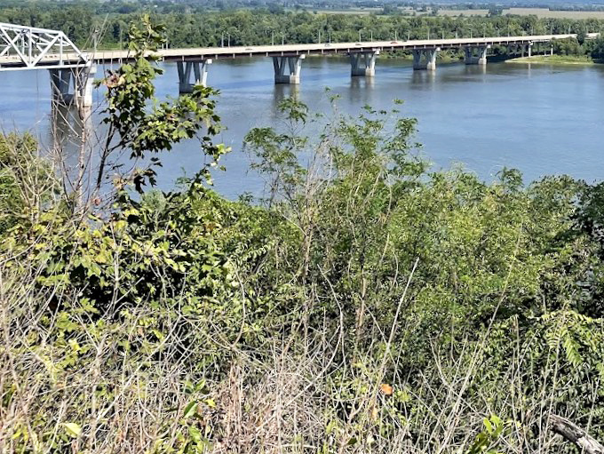 The Mississippi River Bridge stretches across the same waters that carried young Samuel Clemens's imagination toward literary greatness.