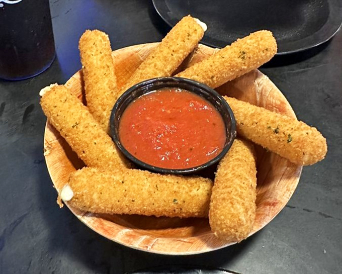Mozzarella sticks that achieve the impossible: a perfectly crisp exterior giving way to that Instagram-worthy cheese pull. Dunk with abandon.
