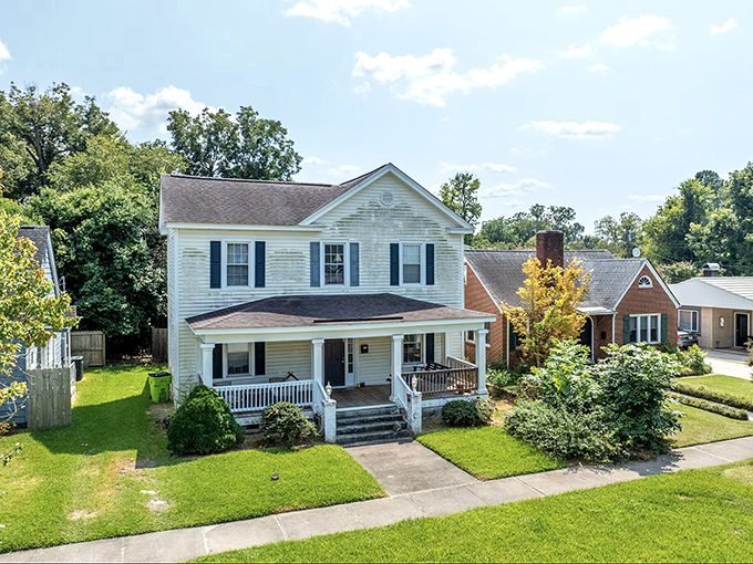 Classic Southern front porches invite you to slow down and remember when people actually talked to their neighbors instead of just texting them.