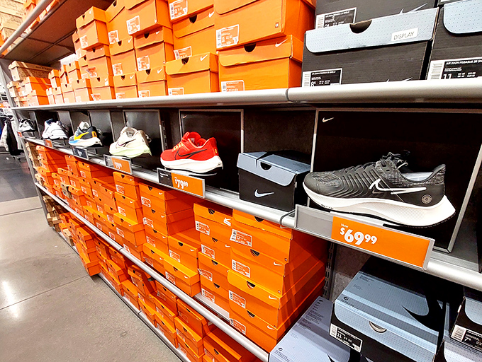 Nike's orange boxes create a visual symphony of savings where athletic dreams meet reality-friendly price tags and happy feet.