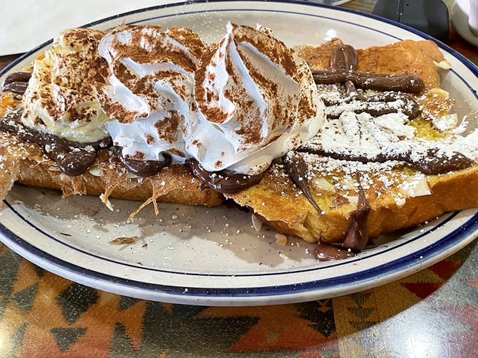 French toast that's had a romantic encounter with Nutella and whipped cream. The breakfast equivalent of a luxury spa treatment.