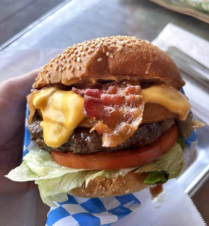 This towering masterpiece includes crispy fish on a burger—because why choose when you can have everything?