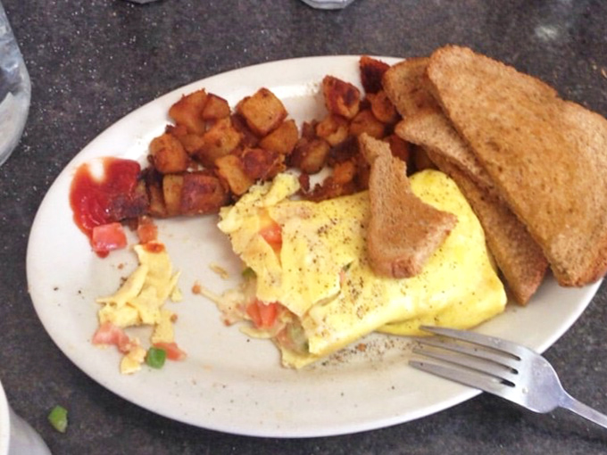 Breakfast alchemy at its finest. Those home fries have achieved the perfect crisp-to-tender ratio that most of us can only dream about.
