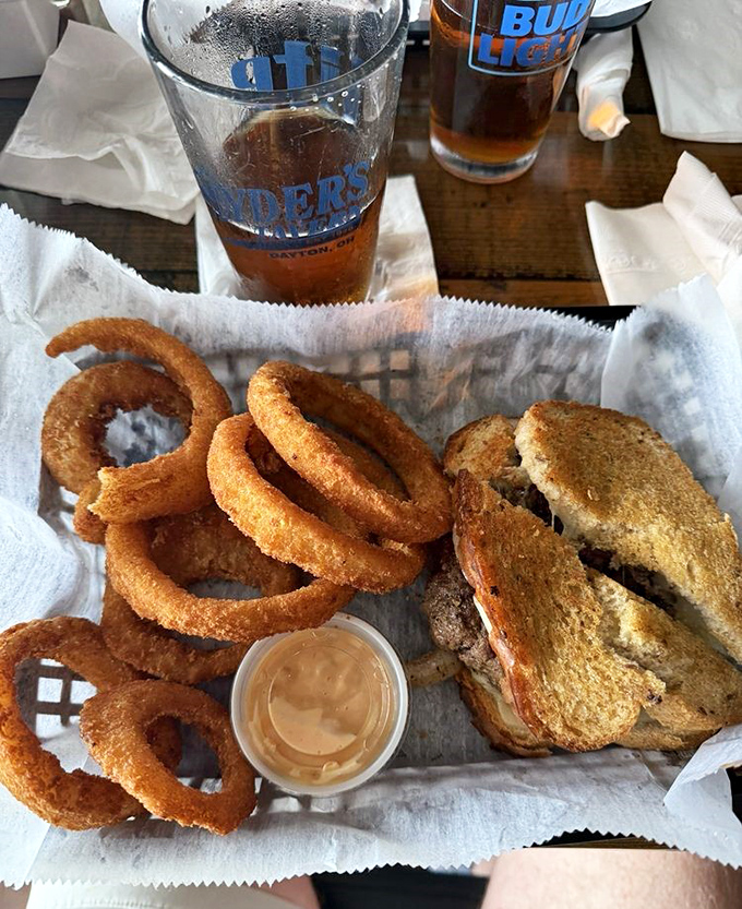 Onion rings and a patty melt: the dynamic duo of tavern cuisine. Like Batman and Robin, if they were delicious and came with special sauce.