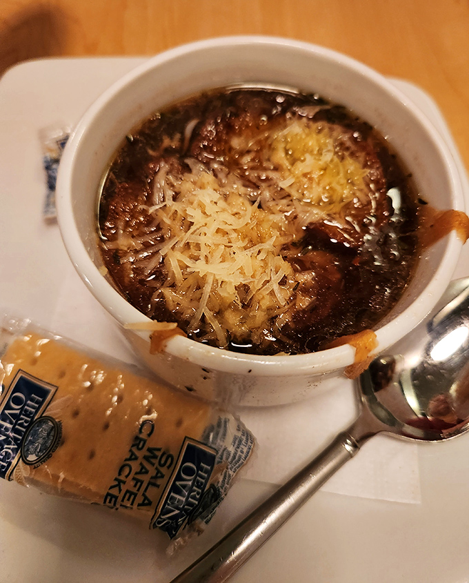 French onion soup that's worth the cheese pull struggle. That golden cap of bubbling gruy&egrave;re is nature's perfect lid for the savory treasure below.