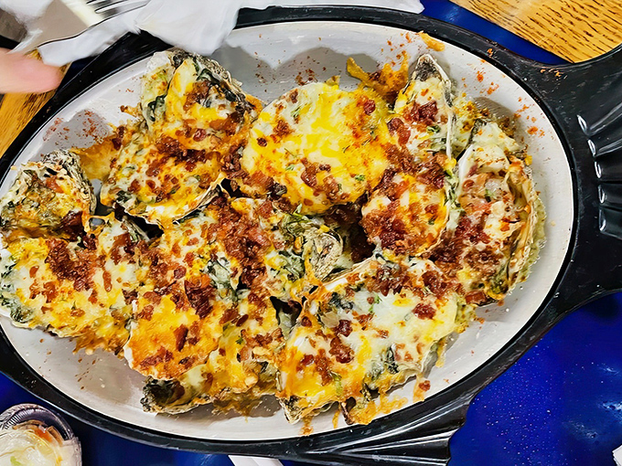 Oysters Rockefeller so decadently topped, they make you understand why the dish was named after America's wealthiest family. Pure indulgence on the half shell.