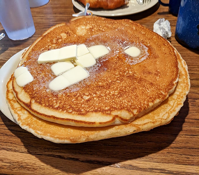 Pancakes so perfectly golden and fluffy, they look like they're auditioning for a butter commercial and nailing the callback.