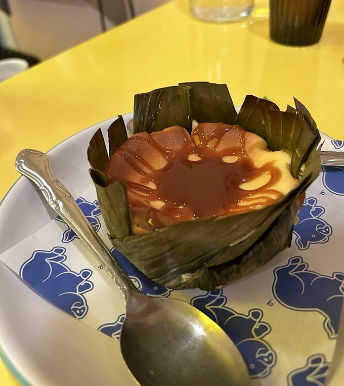 Not your average dessert! This pandan creation nestled in banana leaves combines creamy sweetness with tropical notes that transport you straight to the Philippines.