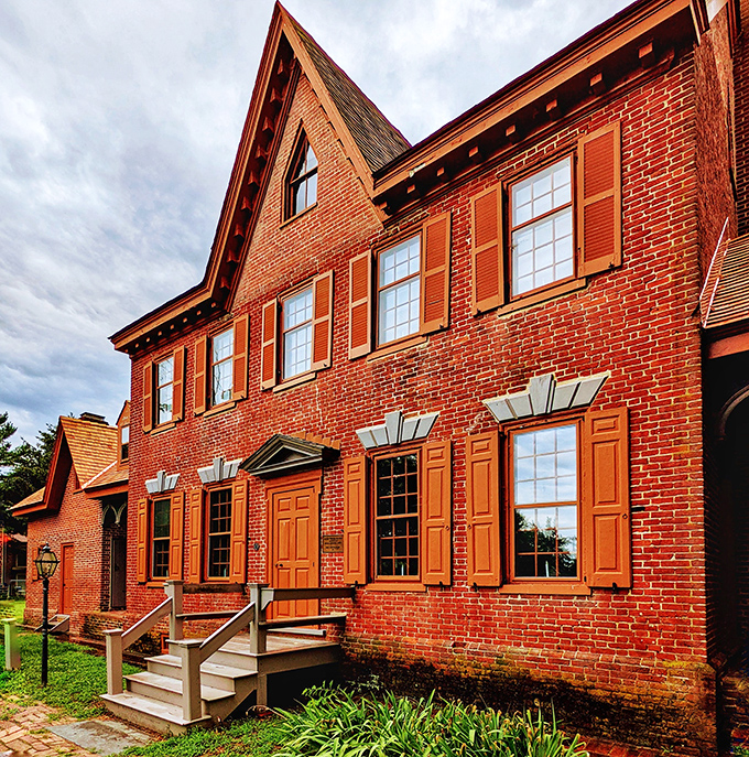The Parson Thorne Mansion stands proudly in its brick-and-shuttered glory, like a dignified elder statesman who's seen centuries of Milford history unfold.