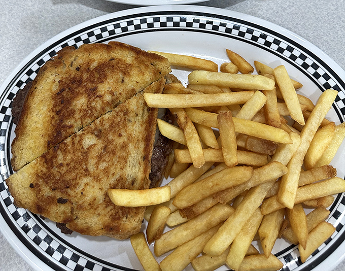 This golden-brown patty melt with crispy fries proves Mama's Kitchen isn't just a one-trick breakfast pony.
