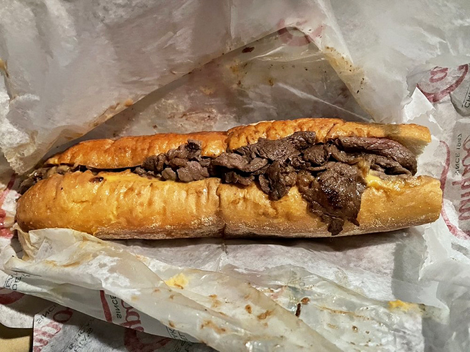 Behold the icon itself&mdash;thinly sliced ribeye nestled in a pillowy roll, where beef and bread achieve the harmony we all wish existed in politics.