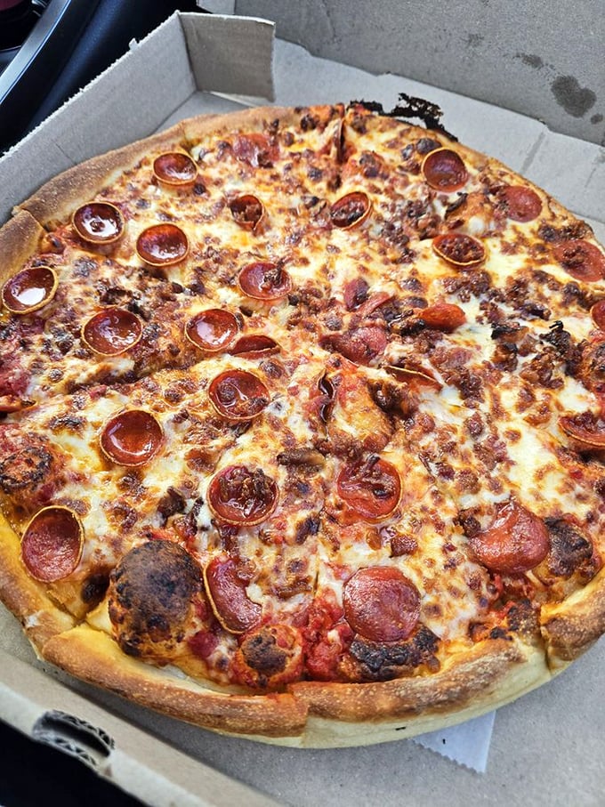 A pepperoni masterpiece with those coveted crispy-edged cups that collect tiny pools of delicious oil &ndash; pizza engineering at its finest.