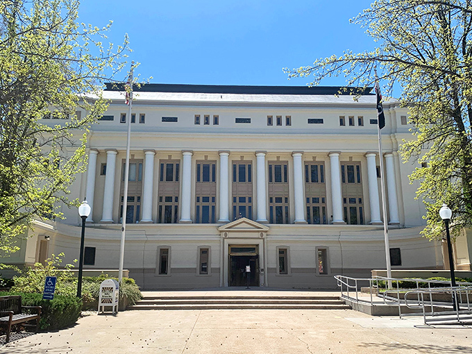 The courthouse stands like a dignified elder statesman, its columns and symmetry a reminder that some architecture deserves more than a casual glance.