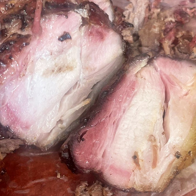 Pork belly that melts like butter in Texas heat. The layers of fat and meat create a symphony that Mozart would have composed had he been a pitmaster.