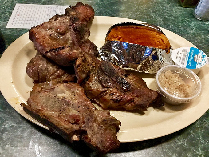 Country-style pork ribs that require strategic napkin placement and possibly a forgiving waistband for optimal enjoyment.