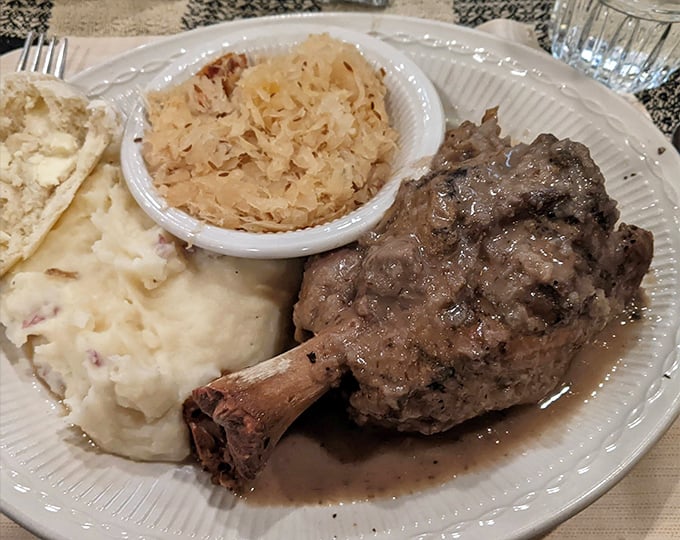 This pork shank didn't just fall off the bone&mdash;it practically leapt off with enthusiasm, ready to meet its sauerkraut and mashed potato companions.