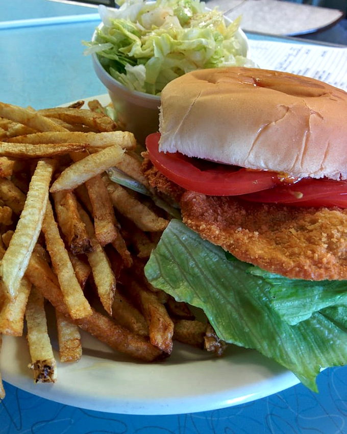 The pork tenderloin sandwich &ndash; where the meat decided the bun was merely a suggestion. Midwestern portion sizes at their most magnificent.