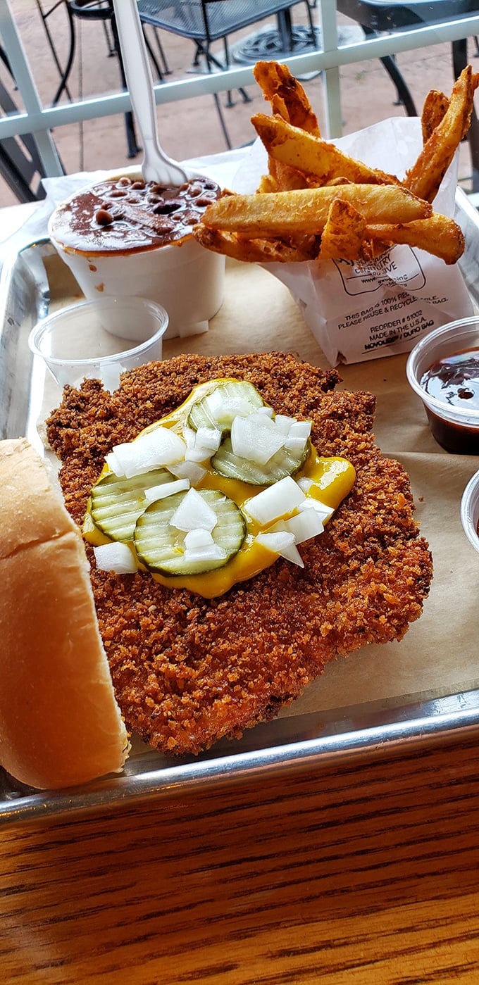 The pork tenderloin sandwich &ndash; a Midwest classic that's been breaded, fried, and topped with just enough pickles to cut through the richness.