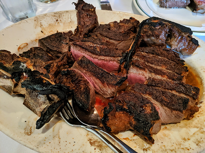 The porterhouse arrives like a work of primal art&mdash;charred exterior giving way to that perfect rosy center that beef aficionados dream about.