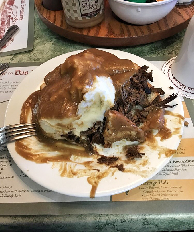 Pot roast and mashed potatoes swimming in rich gravy – the kind of plate that makes you want to hug the chef.