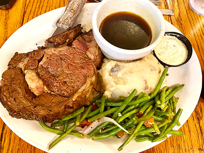 A prime rib that's been cooked so perfectly, it practically deserves its own ZIP code. Those green beans are just along for the spectacular ride.