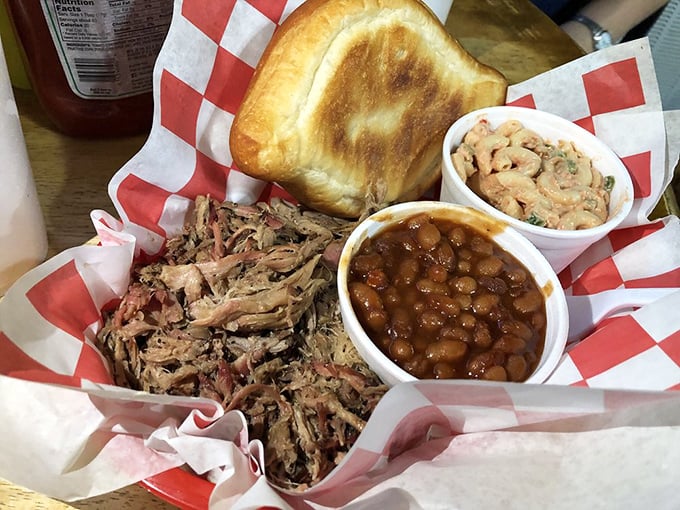 Pulled pork perfection with sides that don't play second fiddle. That Texas toast isn't just a vehicle – it's part of the experience.