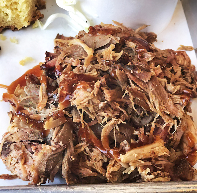 This pulled pork doesn't just "pull"&mdash;it practically disintegrates into a harmonious symphony of smoke, spice, and sauce.