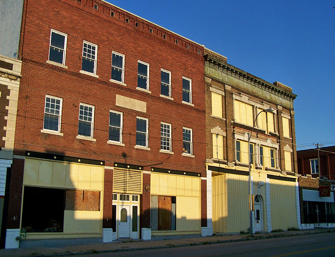 The Rains Bros Building whispers stories of Joplin's past while awaiting its next chapter. These brick facades have witnessed more history than your uncle who claims he invented the internet.