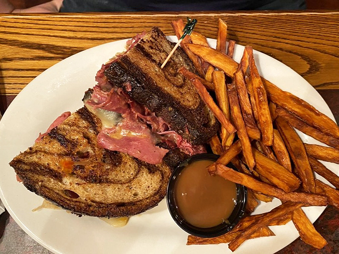 The Reuben sandwich: where corned beef, sauerkraut, and Swiss cheese hold their annual "make a grown adult swoon" convention between two slices of rye.