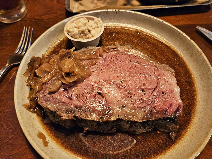 The star of the show in all its glory&mdash;prime rib bathed in natural jus with caramelized onions that would make even vegetarians reconsider their life choices.