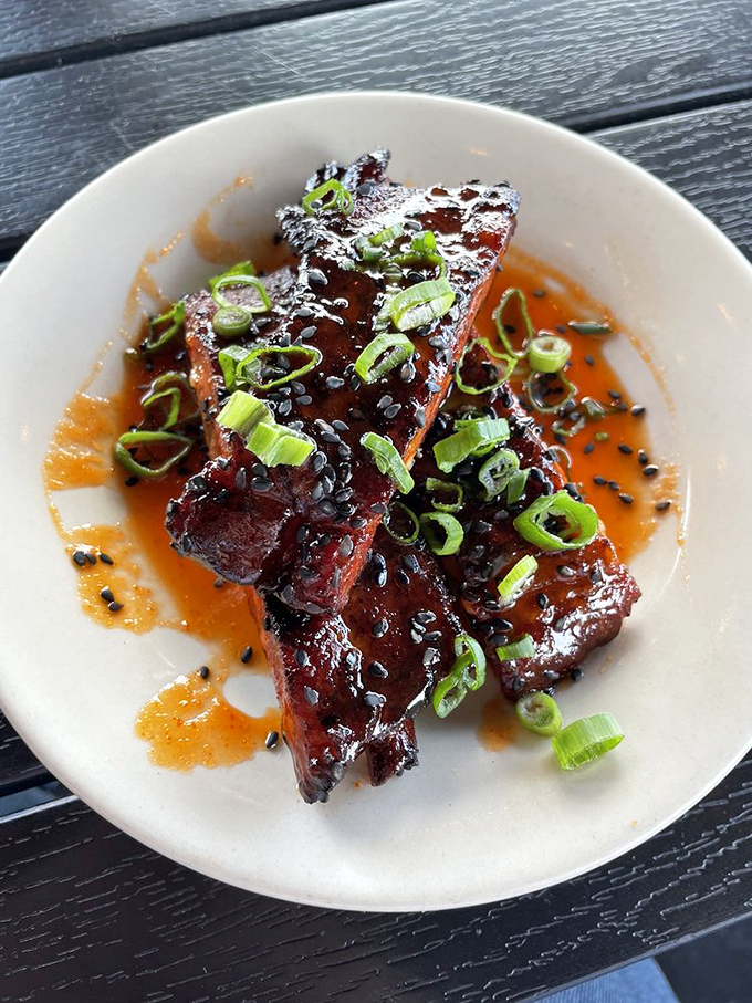 Glazed ribs glistening with sauce and scallions&mdash;these beauties could make a vegetarian reconsider their life choices.