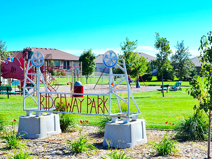 Ridgeway Park welcomes families with whimsical entrance sculptures that promise adventure and laughter&mdash;suburban paradise with a dash of artistic flair.